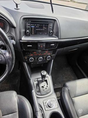 Melns Mazda CX-5 2014 Viļņa, ar dzinēja tilpumu 2.19 L un nobraukumu 235 tūkst. km par 3400 €, foto 11 vietnē AUTOMOTO.COM.LV