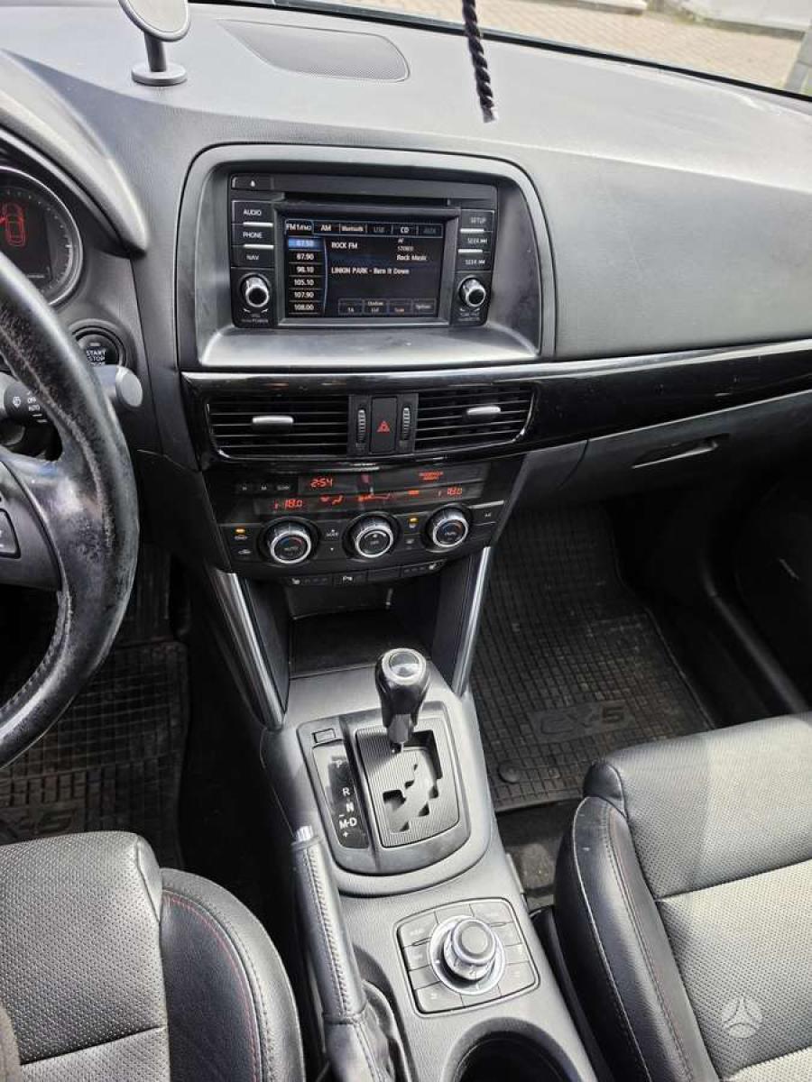Melns Mazda CX-5 2014 Viļņa, ar dzinēja tilpumu 2.19 L un nobraukumu 235 tūkst. km par 3400 €, foto 11 vietnē AUTOMOTO.COM.LV