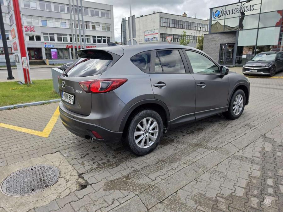 Melns Mazda CX-5 2014 Viļņa, ar dzinēja tilpumu 2.19 L un nobraukumu 235 tūkst. km par 3400 €, foto 18 vietnē AUTOMOTO.COM.LV