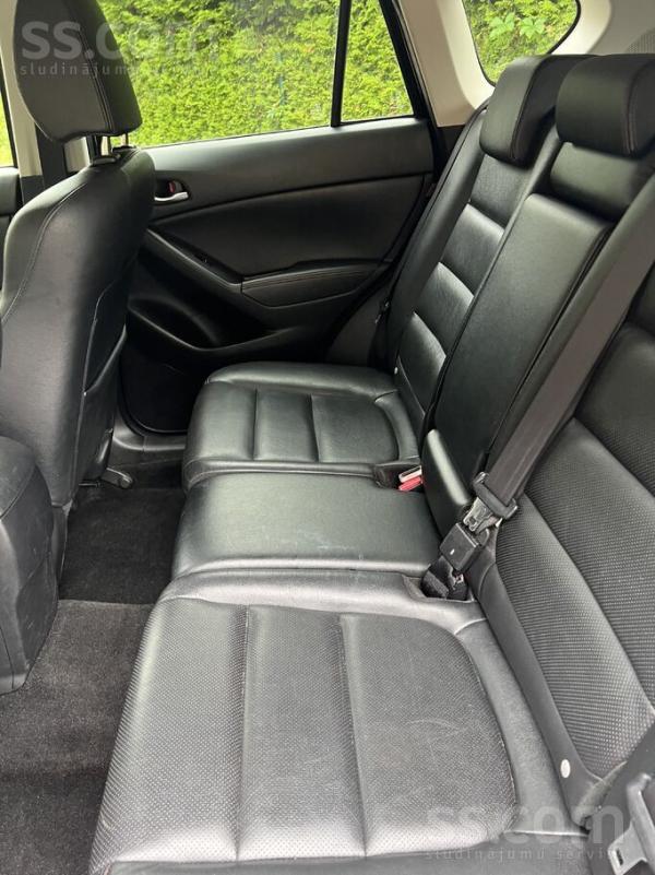 Melns Mazda CX-5 2014 Rīga, ar dzinēja tilpumu 2.20 L un nobraukumu 218 tūkst. km par 10000 €, foto 6 vietnē AUTOMOTO.COM.LV