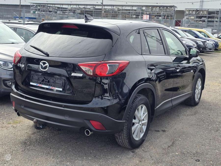 Melns Mazda CX-5 2014 Kauņa, ar dzinēja tilpumu 2.19 L un nobraukumu 198 tūkst. km par 7700 €, foto 5 vietnē AUTOMOTO.COM.LV
