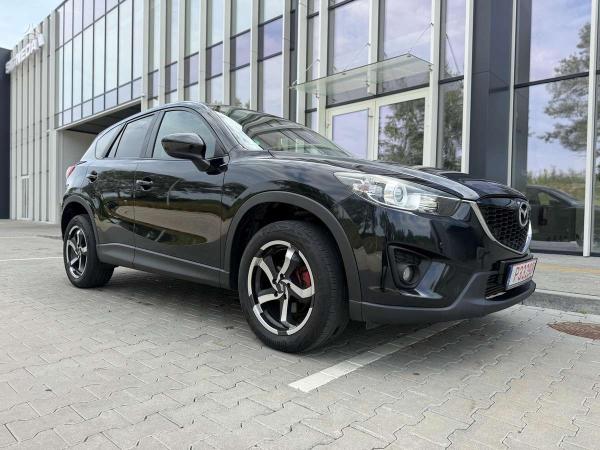 Melns Mazda CX-5 2014 Viļņa, ar dzinēja tilpumu 2.19 L un nobraukumu 300 tūkst. km par 5999 €, foto 2 vietnē AUTOMOTO.COM.LV