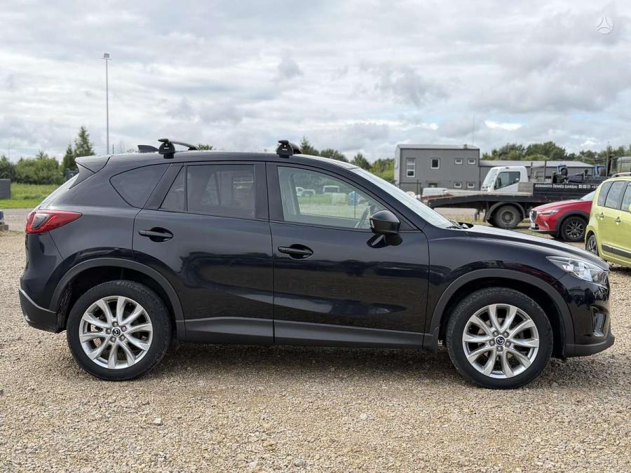 Melns Mazda CX-5 2014 Šauļi, ar dzinēja tilpumu 2.19 L un nobraukumu 231 tūkst. km par 6100 €, foto 5 vietnē AUTOMOTO.COM.LV