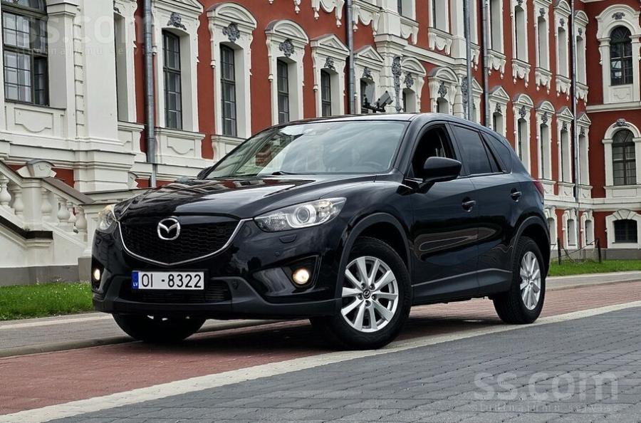 Black Mazda CX-5 2014 in Jelgava, with an engine capacity of 2.20 L and mileage of 266 thousand km for 7490 €, photo 3 on AUTOMOTO.COM.LV