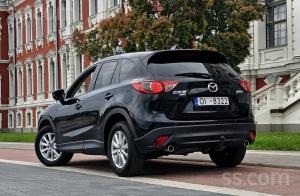 Black Mazda CX-5 2014 in Jelgava, with an engine capacity of 2.20 L and mileage of 266 thousand km for 7490 €, photo 6 on AUTOMOTO.COM.LV