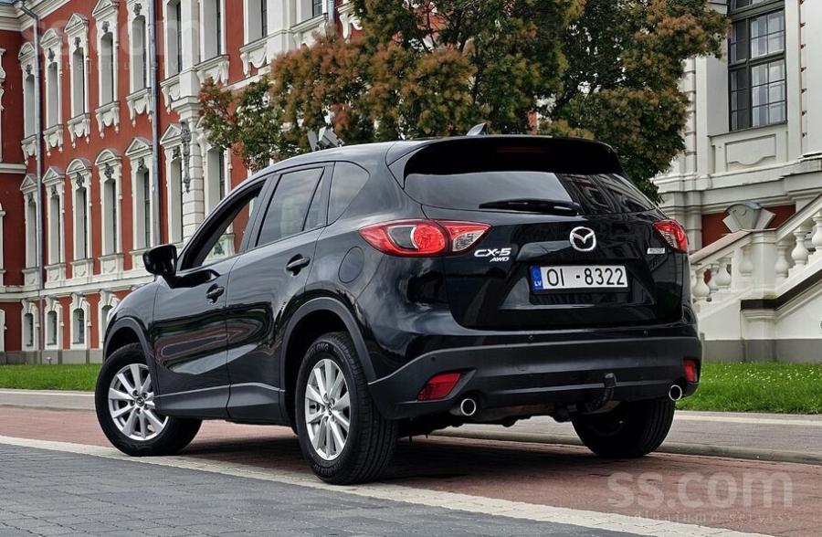 Black Mazda CX-5 2014 in Jelgava, with an engine capacity of 2.20 L and mileage of 266 thousand km for 7490 €, photo 6 on AUTOMOTO.COM.LV