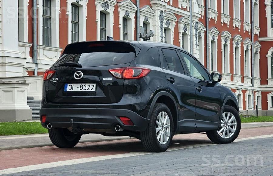 Black Mazda CX-5 2014 in Jelgava, with an engine capacity of 2.20 L and mileage of 266 thousand km for 7490 €, photo 7 on AUTOMOTO.COM.LV