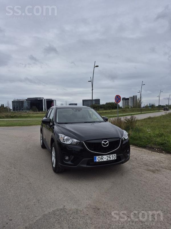 Melns Mazda CX-5 2014 Rīga, ar dzinēja tilpumu 2.20 L un nobraukumu 216 tūkst. km par 7990 €, foto 1 vietnē AUTOMOTO.COM.LV