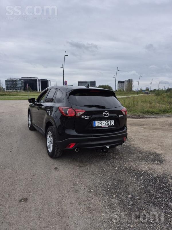 Melns Mazda CX-5 2014 Rīga, ar dzinēja tilpumu 2.20 L un nobraukumu 216 tūkst. km par 7990 €, foto 4 vietnē AUTOMOTO.COM.LV