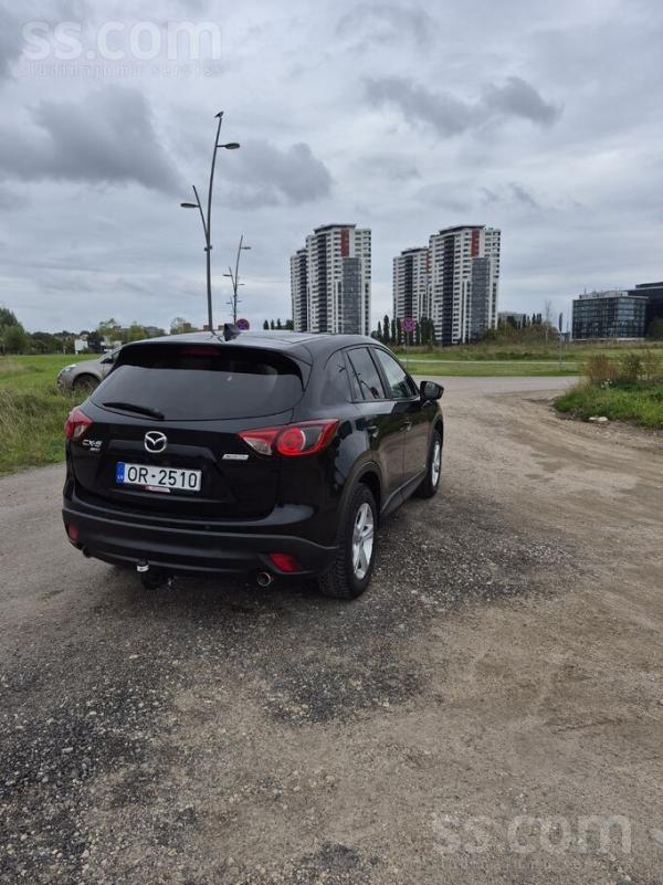 Melns Mazda CX-5 2014 Rīga, ar dzinēja tilpumu 2.20 L un nobraukumu 216 tūkst. km par 7990 €, foto 5 vietnē AUTOMOTO.COM.LV