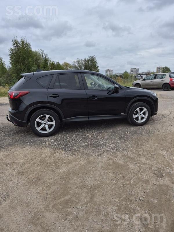 Melns Mazda CX-5 2014 Rīga, ar dzinēja tilpumu 2.20 L un nobraukumu 216 tūkst. km par 7990 €, foto 6 vietnē AUTOMOTO.COM.LV