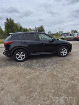 Melns Mazda CX-5 2014 Rīga, ar dzinēja tilpumu 2.20 L un nobraukumu 216 tūkst. km par 7990 €, foto 6 vietnē AUTOMOTO.COM.LV