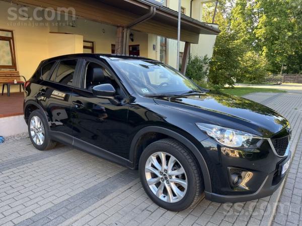 Черный Мазда СХ-5 2014 в Рига, объемом двигателя 2.20 л и пробегом 220 тыс. км за 10000 €, фото 1 на AUTOMOTO.COM.LV