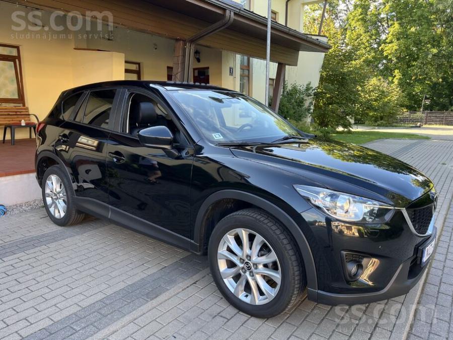 Черный Мазда СХ-5 2014 в Рига, объемом двигателя 2.20 л и пробегом 220 тыс. км за 10000 €, фото 1 на AUTOMOTO.COM.LV