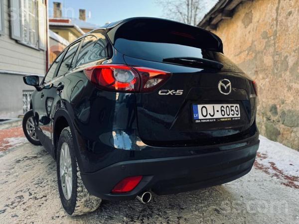 Black Mazda CX-5 2015 in Cesis, with an engine capacity of 2.20 L and mileage of 0 thousand km for 9500 €, photo 7 on AUTOMOTO.COM.LV
