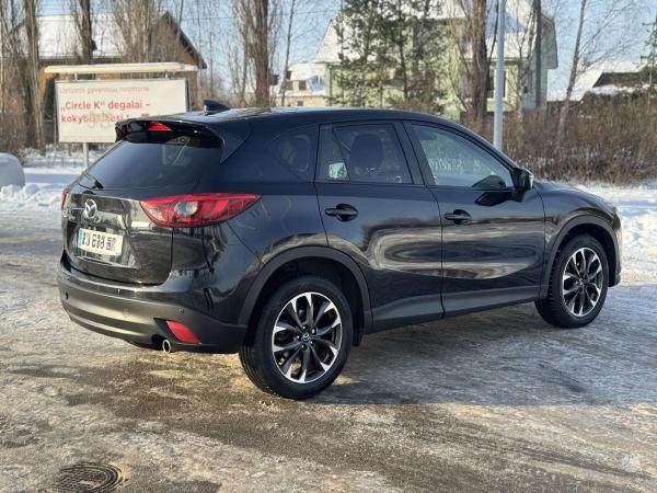 Melns Mazda CX-5 2015 Tauragė, ar dzinēja tilpumu 2.19 L un nobraukumu 222 tūkst. km par 8400 €, foto 4 vietnē AUTOMOTO.COM.LV