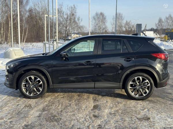 Melns Mazda CX-5 2015 Tauragė, ar dzinēja tilpumu 2.19 L un nobraukumu 222 tūkst. km par 8400 €, foto 7 vietnē AUTOMOTO.COM.LV