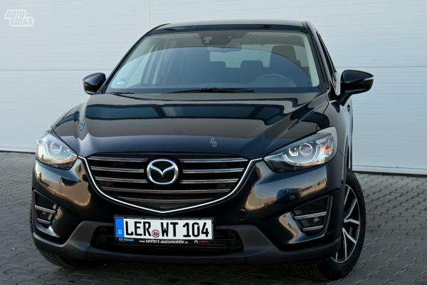 Melns Mazda CX-5 2015 Kretinga, ar dzinēja tilpumu 2.00 L un nobraukumu 169 tūkst. km par 9099 €, foto 2 vietnē AUTOMOTO.COM.LV