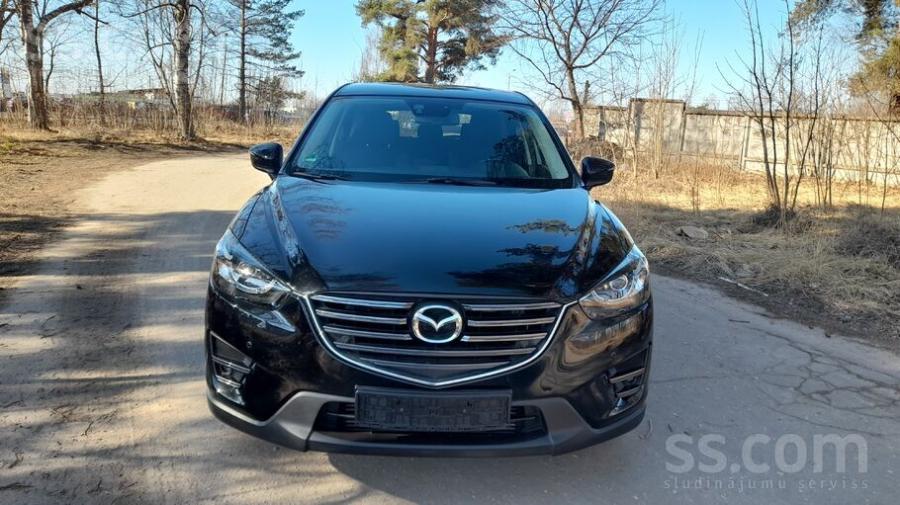 Black Mazda CX-5 2015 in Riga, with an engine capacity of 2.20 L and mileage of 179 thousand km for 8100 €, photo 1 on AUTOMOTO.COM.LV
