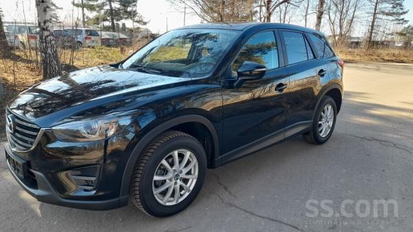 Black Mazda CX-5 2015 in Riga, with an engine capacity of 2.20 L and mileage of 179 thousand km for 8100 €, photo 4 on AUTOMOTO.COM.LV