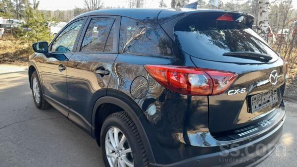 Black Mazda CX-5 2015 in Riga, with an engine capacity of 2.20 L and mileage of 179 thousand km for 8100 €, photo 5 on AUTOMOTO.COM.LV