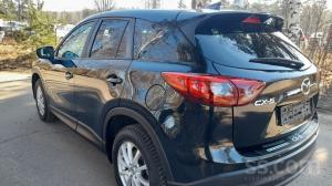 Black Mazda CX-5 2015 in Riga, with an engine capacity of 2.20 L and mileage of 179 thousand km for 8100 €, photo 5 on AUTOMOTO.COM.LV