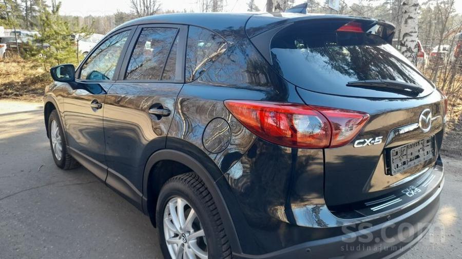Black Mazda CX-5 2015 in Riga, with an engine capacity of 2.20 L and mileage of 179 thousand km for 8100 €, photo 5 on AUTOMOTO.COM.LV
