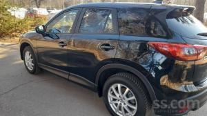 Black Mazda CX-5 2015 in Riga, with an engine capacity of 2.20 L and mileage of 179 thousand km for 8100 €, photo 6 on AUTOMOTO.COM.LV