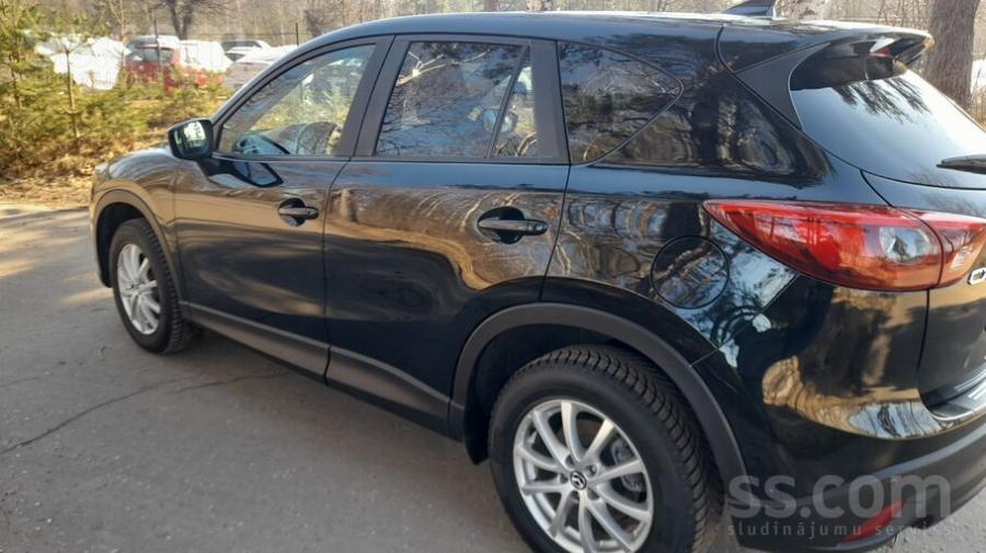 Black Mazda CX-5 2015 in Riga, with an engine capacity of 2.20 L and mileage of 179 thousand km for 8100 €, photo 6 on AUTOMOTO.COM.LV