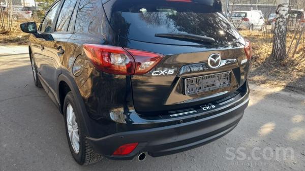 Black Mazda CX-5 2015 in Riga, with an engine capacity of 2.20 L and mileage of 179 thousand km for 8100 €, photo 7 on AUTOMOTO.COM.LV