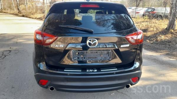 Black Mazda CX-5 2015 in Riga, with an engine capacity of 2.20 L and mileage of 179 thousand km for 8100 €, photo 8 on AUTOMOTO.COM.LV