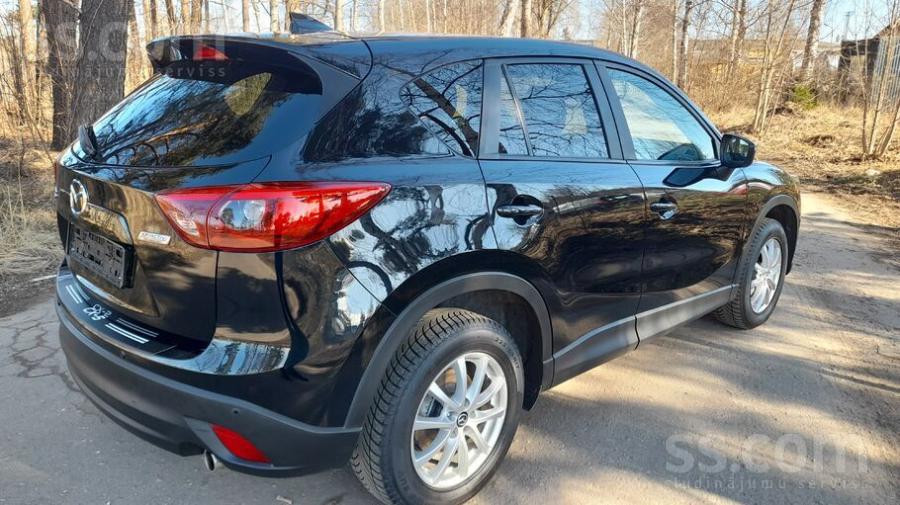 Black Mazda CX-5 2015 in Riga, with an engine capacity of 2.20 L and mileage of 179 thousand km for 8100 €, photo 10 on AUTOMOTO.COM.LV