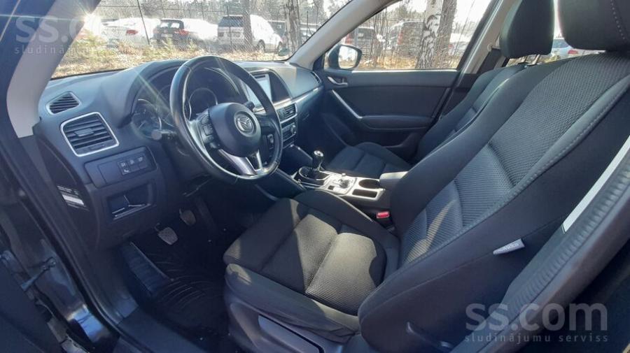 Black Mazda CX-5 2015 in Riga, with an engine capacity of 2.20 L and mileage of 179 thousand km for 8100 €, photo 14 on AUTOMOTO.COM.LV