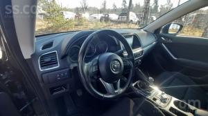 Black Mazda CX-5 2015 in Riga, with an engine capacity of 2.20 L and mileage of 179 thousand km for 8100 €, photo 15 on AUTOMOTO.COM.LV