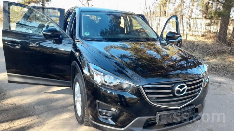 Black Mazda CX-5 2015 in Riga, with an engine capacity of 2.20 L and mileage of 179 thousand km for 8100 €, photo 31 on AUTOMOTO.COM.LV