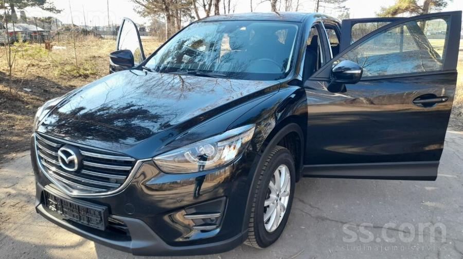 Black Mazda CX-5 2015 in Riga, with an engine capacity of 2.20 L and mileage of 179 thousand km for 8100 €, photo 32 on AUTOMOTO.COM.LV