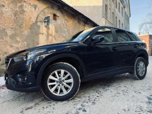 Black Mazda CX-5 2015 in Cesis, with an engine capacity of 2.20 L and mileage of 0 thousand km for 8990 €, photo 5 on AUTOMOTO.COM.LV
