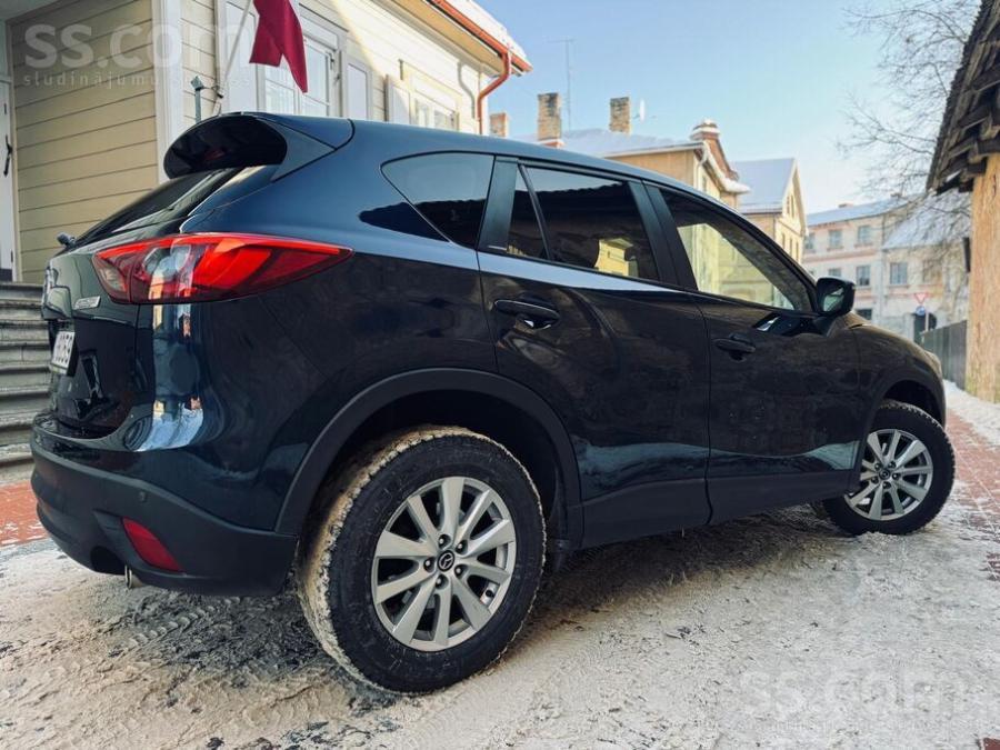 Black Mazda CX-5 2015 in Cesis, with an engine capacity of 2.20 L and mileage of 0 thousand km for 8990 €, photo 7 on AUTOMOTO.COM.LV