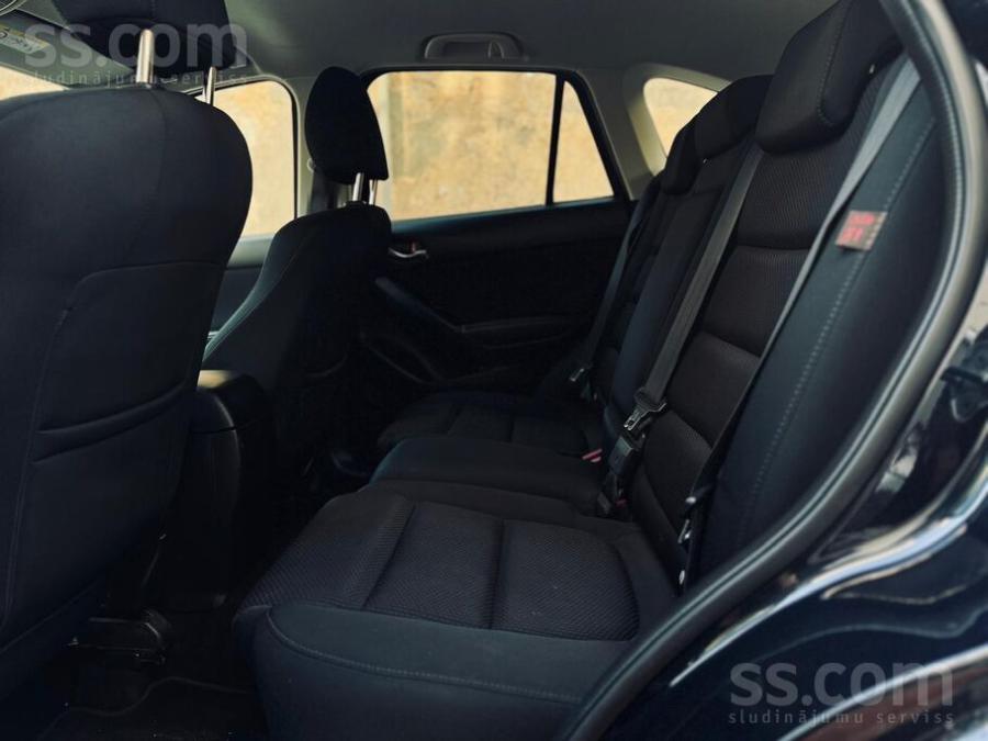 Black Mazda CX-5 2015 in Cesis, with an engine capacity of 2.20 L and mileage of 0 thousand km for 8990 €, photo 11 on AUTOMOTO.COM.LV