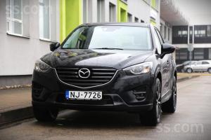 Black Mazda CX-5 2015 in Riga, with an engine capacity of 2.20 L and mileage of 230 thousand km for 7995 €, photo  on AUTOMOTO.COM.LV