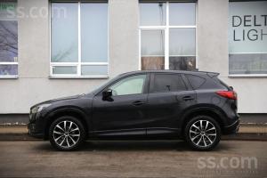 Black Mazda CX-5 2015 in Riga, with an engine capacity of 2.20 L and mileage of 230 thousand km for 7995 €, photo 3 on AUTOMOTO.COM.LV