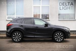 Black Mazda CX-5 2015 in Riga, with an engine capacity of 2.20 L and mileage of 230 thousand km for 7995 €, photo 4 on AUTOMOTO.COM.LV