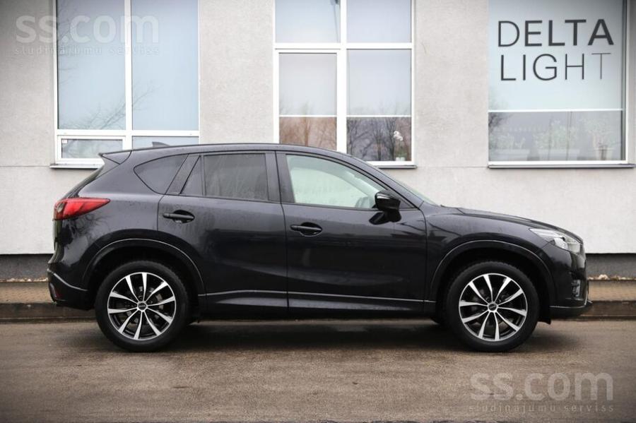 Black Mazda CX-5 2015 in Riga, with an engine capacity of 2.20 L and mileage of 230 thousand km for 7995 €, photo 4 on AUTOMOTO.COM.LV