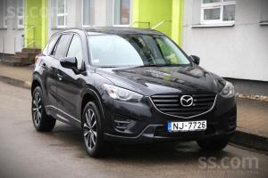 Black Mazda CX-5 2015 in Riga, with an engine capacity of 2.20 L and mileage of 230 thousand km for 7995 €, photo 5 on AUTOMOTO.COM.LV
