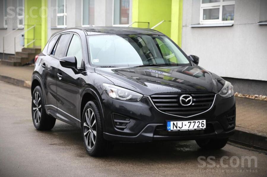 Black Mazda CX-5 2015 in Riga, with an engine capacity of 2.20 L and mileage of 230 thousand km for 7995 €, photo 5 on AUTOMOTO.COM.LV