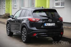 Black Mazda CX-5 2015 in Riga, with an engine capacity of 2.20 L and mileage of 230 thousand km for 7995 €, photo 6 on AUTOMOTO.COM.LV