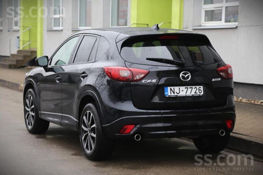 Black Mazda CX-5 2015 in Riga, with an engine capacity of 2.20 L and mileage of 230 thousand km for 7995 €, photo 6 on AUTOMOTO.COM.LV