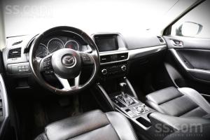 Black Mazda CX-5 2015 in Riga, with an engine capacity of 2.20 L and mileage of 230 thousand km for 7995 €, photo 8 on AUTOMOTO.COM.LV