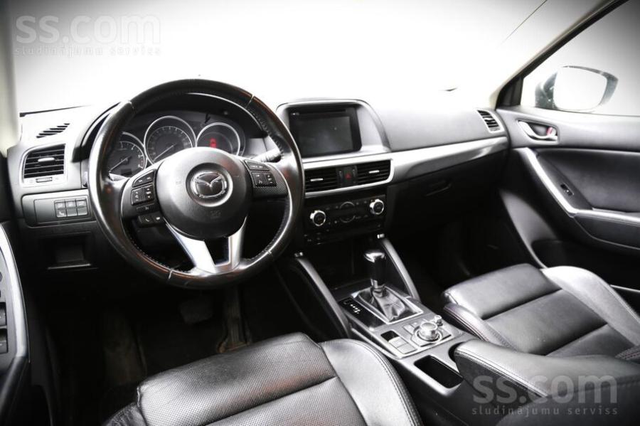 Black Mazda CX-5 2015 in Riga, with an engine capacity of 2.20 L and mileage of 230 thousand km for 7995 €, photo 8 on AUTOMOTO.COM.LV