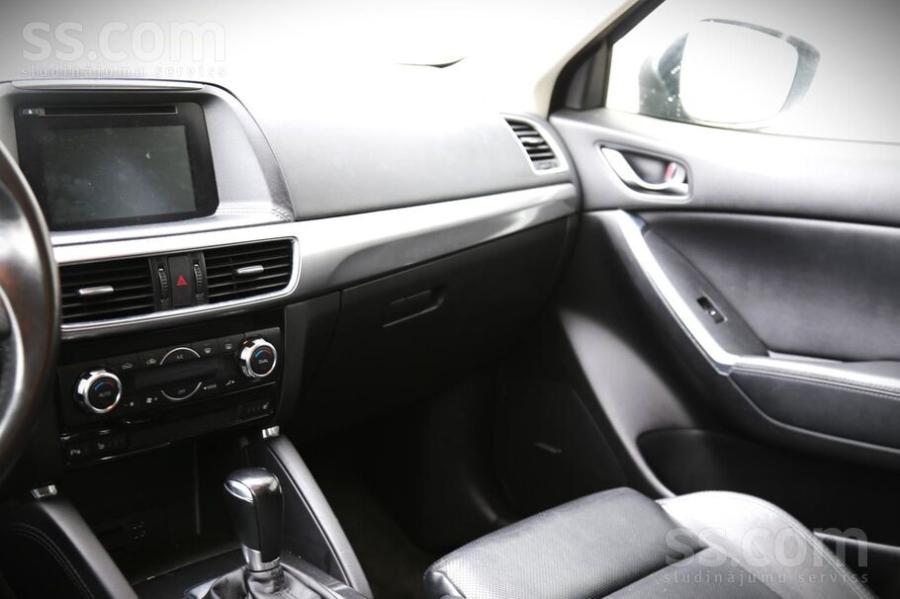 Black Mazda CX-5 2015 in Riga, with an engine capacity of 2.20 L and mileage of 230 thousand km for 7995 €, photo 10 on AUTOMOTO.COM.LV